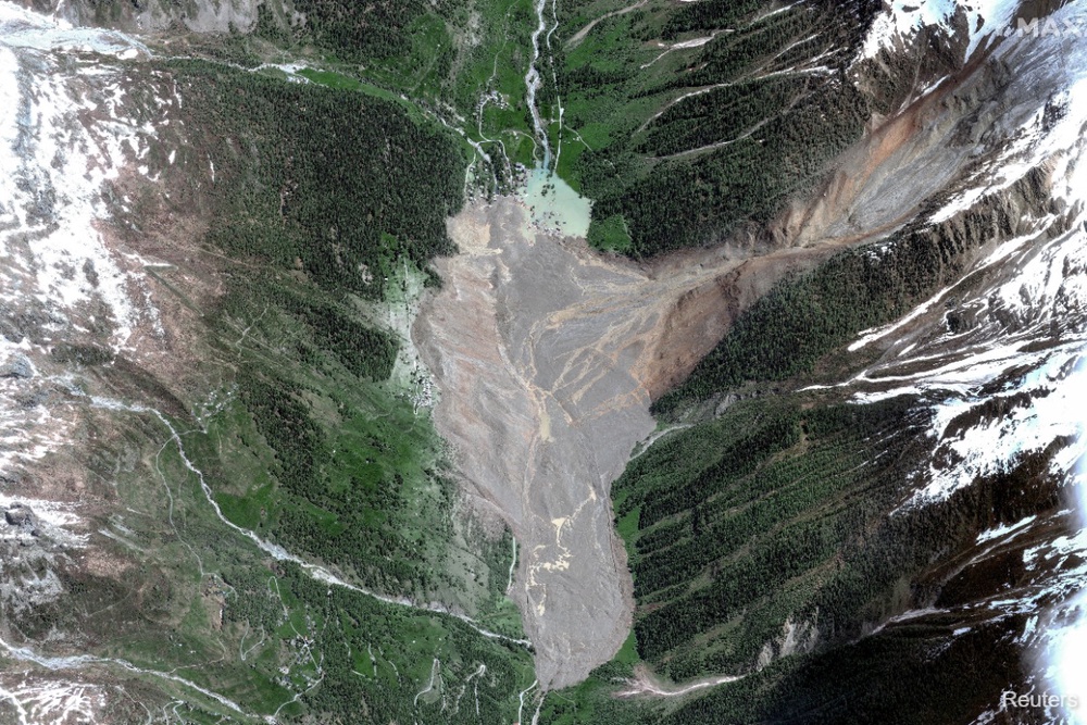 Flood risk threatens Swiss valley after village destroyed by glacier